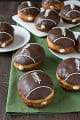 Cream Filled Chocolate Football Donuts